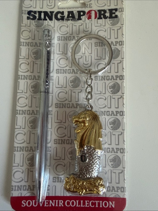 Other | Singapore Souvenir Keychain Featuring A Nail Clip And A Ball ...